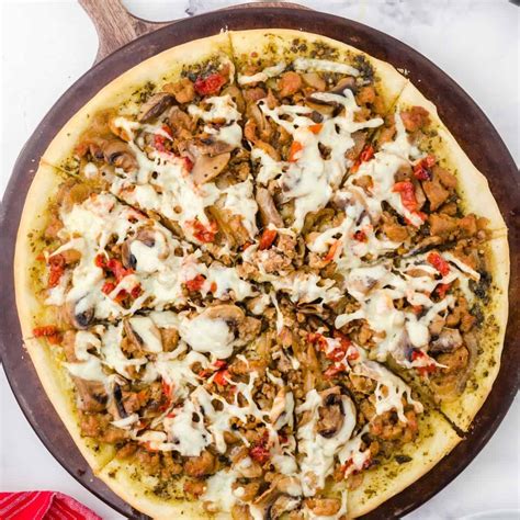 This Homemade Italian Sausage Pizza With Pesto Sauce Is AMAZING
