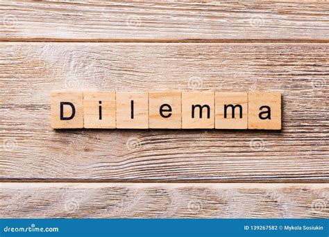 Dilemma Word Written On Wood Block Dilemma Text On Wooden Table For