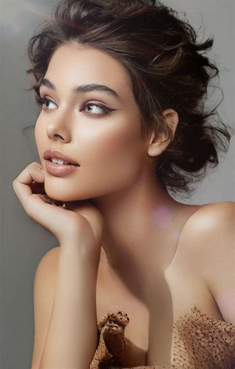 An Image Of A Beautiful Woman Smiling For The Camera