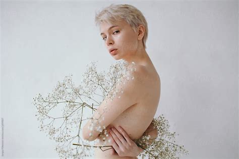 Portrait Of Woman With Short Blonde Hair By Stocksy Contributor