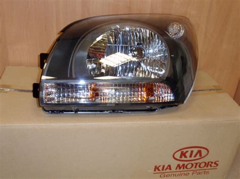 Reflektor Lewy Kia Sportage III 921010Z010