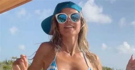 Heidi Klum Jiggles Boobs As She Dances On Beach In Tiny String Bikini