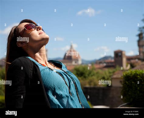 Carefree Mature Woman Sunbathing Hi Res Stock Photography And Images