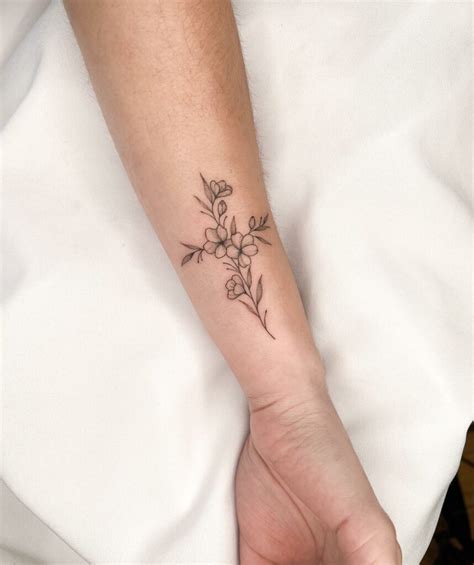 Feminine Cross With Flowers Tattoo Ideas That Will Blow Your Mind