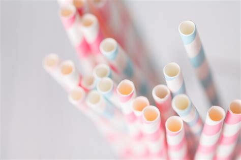 Premium Photo Striped Cocktail Straws In Glass Overhead View