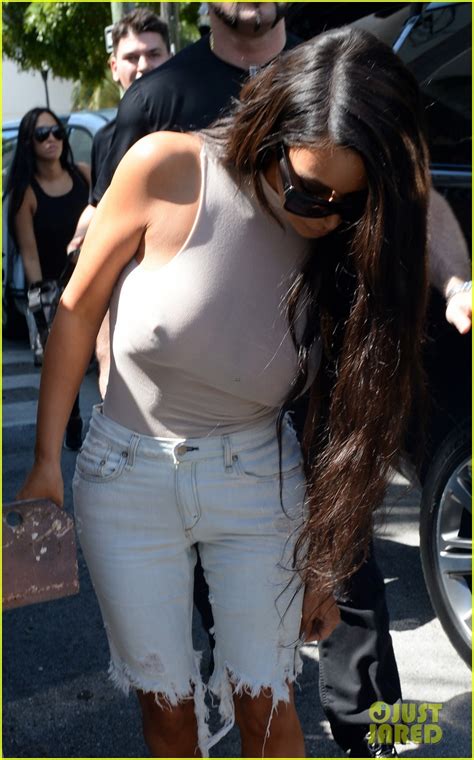 Kim Kardashian Goes Braless While Wearing A See Through Top Photo