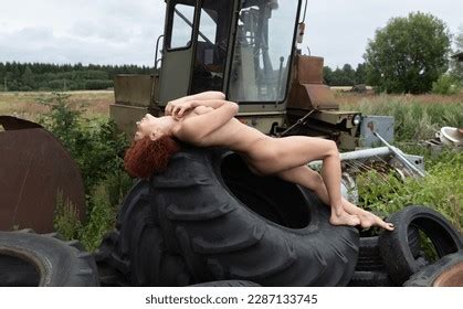 Nude Woman Posing On Large Tractor Stock Photo Shutterstock