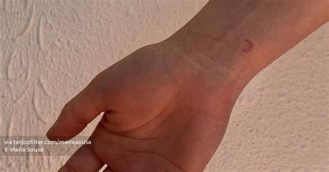 Minimalist Tiny Crescent Moon Tattoo On The Wrist