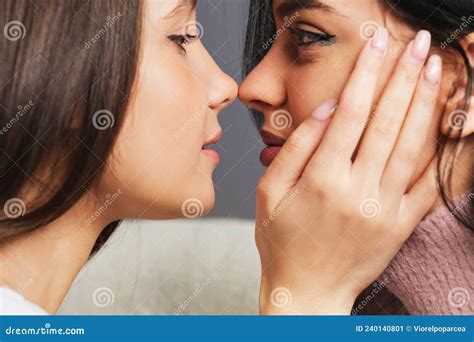 Close Up Side View Photo Of Two Girls In Love Looking At Each Other Enjoying Intimate Tender