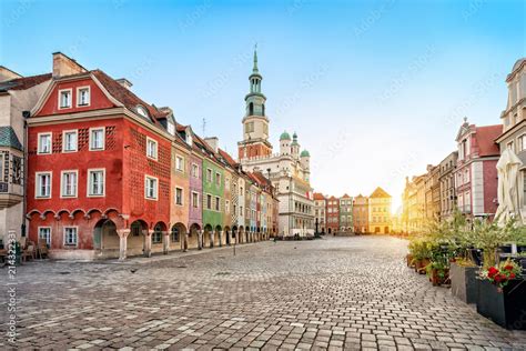 Stary Rynek Square With Small Colorful Houses And Old Town Hall In