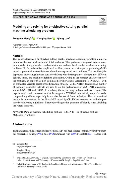 modeling and solving for bi objective cutting parallel machine scheduling problem