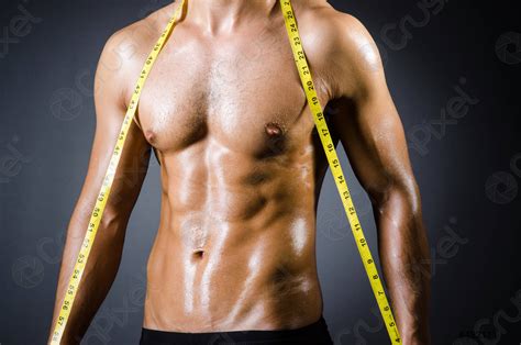 Muscular Man Measuring His Muscles Stock Photo 432111 Crushpixel