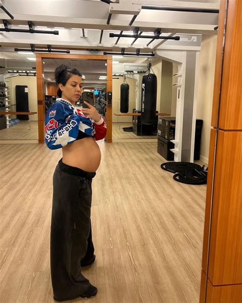 Kourtney Kardashian Flaunts Bare Baby Bump In Mirror Selfies And Hints