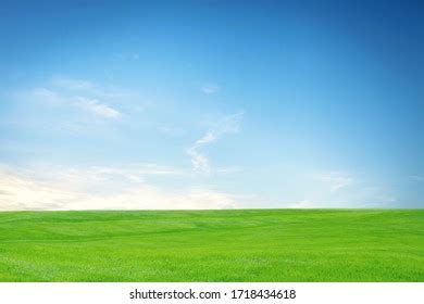Empty Green Grass Field Blue Sky Stock Photo Edit Now 1718434618