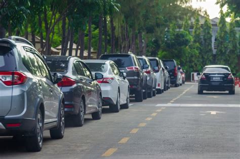 Premium Photo Row Of Car Parked On The Roadside