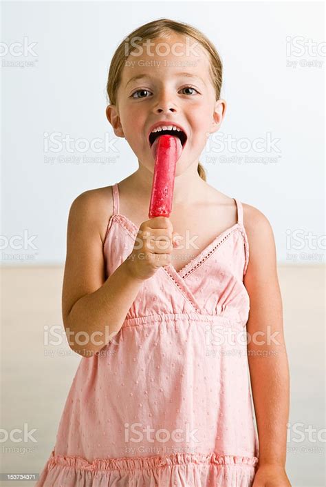 Girl Sucking Popsicle