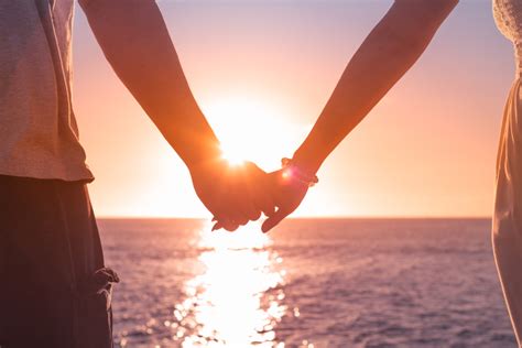Couple Holding Hands At The Beach Love Relationship Concept Vision