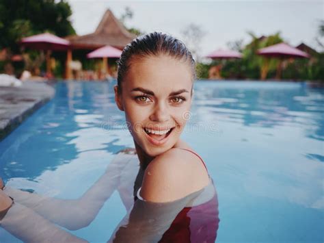 Woman Swimming In The Pool Vacation Luxury Tanning Close Up Stock Image