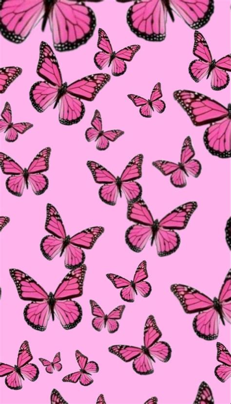 Many Pink Butterflies Flying In The Air With No One On It S Back Ground