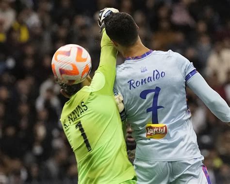 Bruised Ronaldo Scores Twice To Edge Showdown With Messi Sports