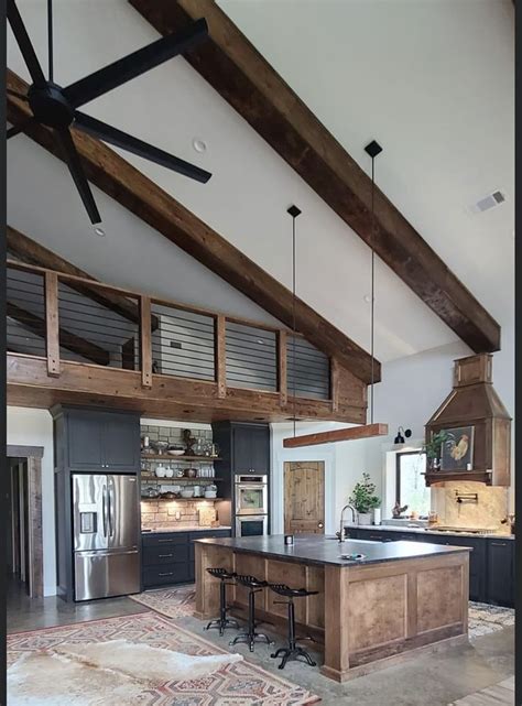 A Large Kitchen With An Island In The Middle