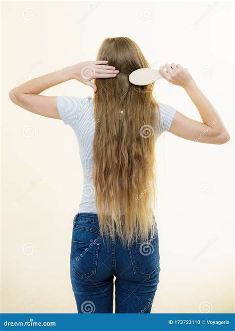 Blonde Girl Brushing Her Long Hair Stock Photo Image Of Splits