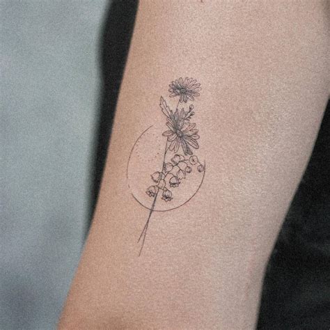 Fine Line Flower Bouquet Tattoo Located On The Upper
