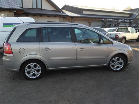 OPEL ZAFIRA B II 2 DRZWI TYŁ PRAWE SREBRNE Z167 7710089750