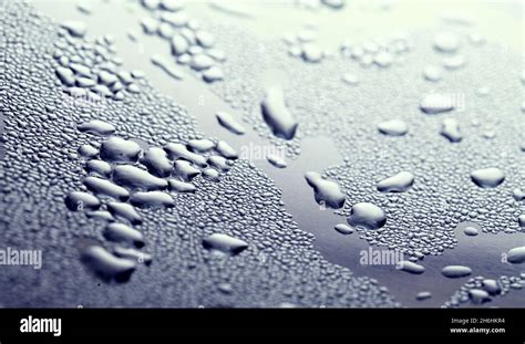 Macro Background With Water Droplets Condensation Pattern On Metal