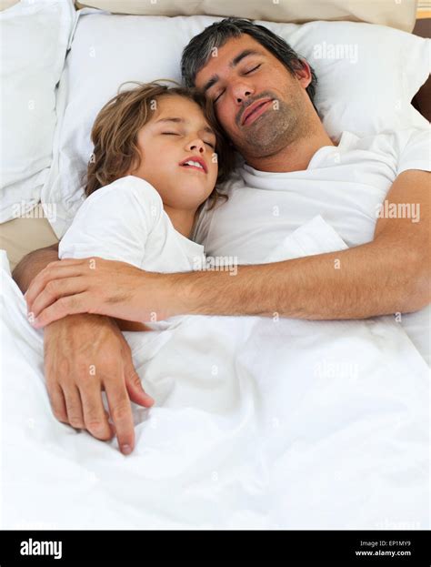 Affectionate Father And His Son Sleeping Together Stock Photo Alamy