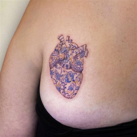 Kintsugi Porcelain Heart Tattooed On The Shoulder