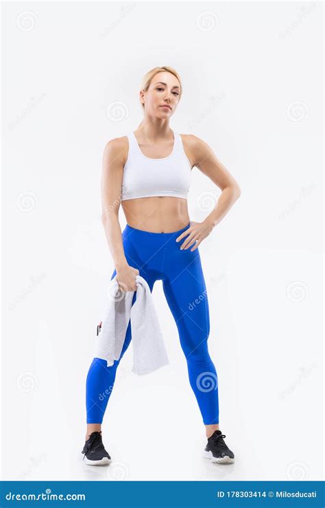 Beautiful Blonde Girl With Towel In Her Hands And Muscular Body Posing Fitness Concept Stock