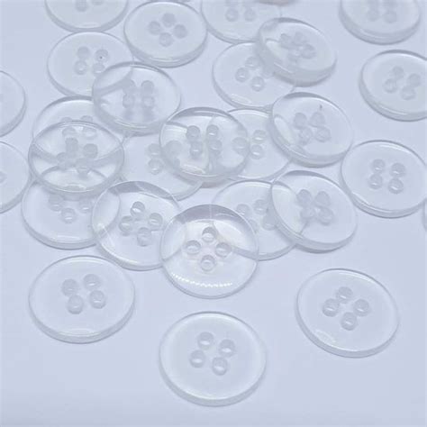 Lot de 60 boutons ronds en résine transparente à 4 trous 15 mm Z3486