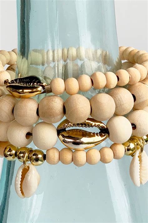 4 Stacked DIY Cowrie Shell Bracelets Made In A Day