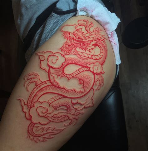 Feminine Dragon Thigh Tattoo