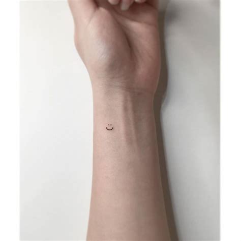 Minimalist Smiley Tattoo On The Wrist