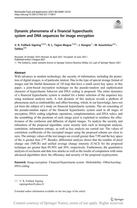 dynamic phenomena of a financial hyperchaotic system and dna sequences for image encryption