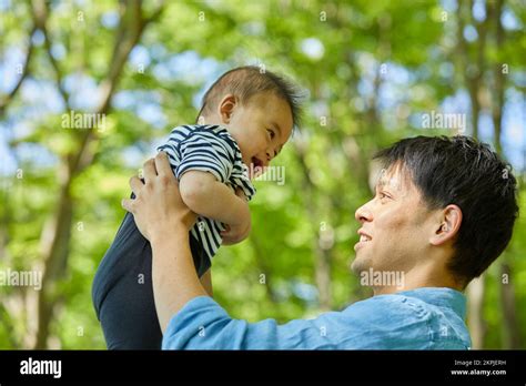 Japanese Father Holding Baby Stock Photo Alamy
