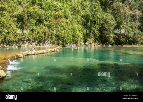 Tourists Enjoying The Beautiful Pools Of Semuc Champey Rio Cabohon