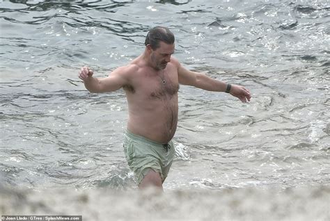 Jon Hamm Exclusive Star Kisses Wife Anna Osceola In Spain On