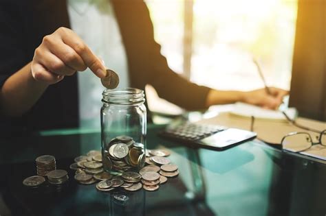 Premium Photo Closeup Of A Businesswoman Calculating Stacking And
