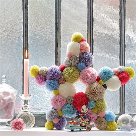 Créer une étoile en pompons Artisanat de pompons Créations à thème