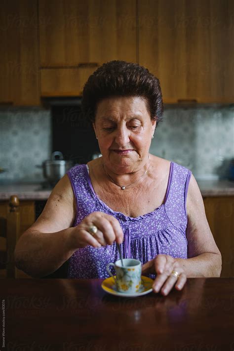Woman Drinks Coffee By Stocksy Contributor Simone Wave Stocksy