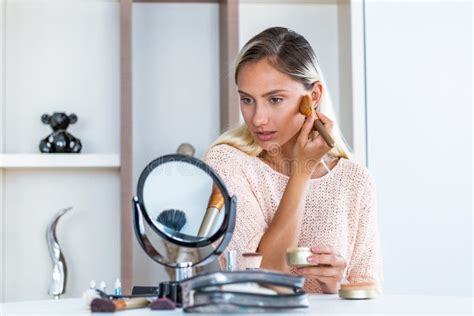 Beauty Woman Applying Makeup Beautiful Girl Looking In The Mirror And
