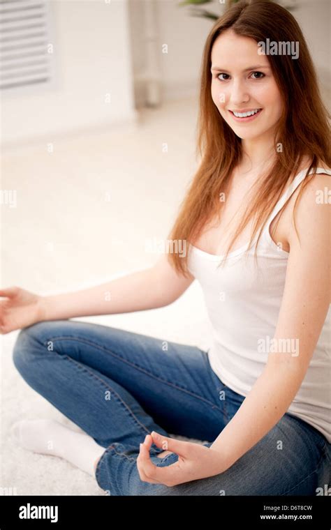Woman Sitting On Floor Stock Photo Alamy