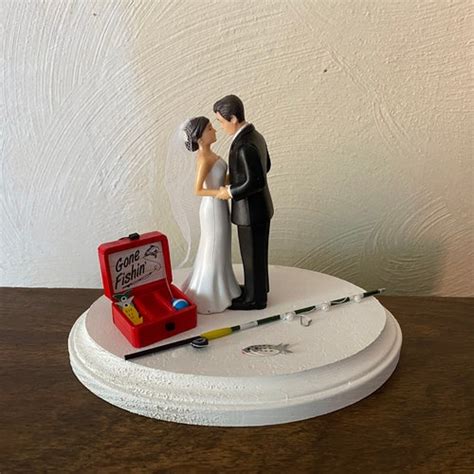 Groom Pulling Bride Wedding Cake Topper Hooked For Life Etsy