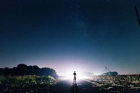 Man Standing In Front Of Light Wallpaper Hd Photography Wallpapers K
