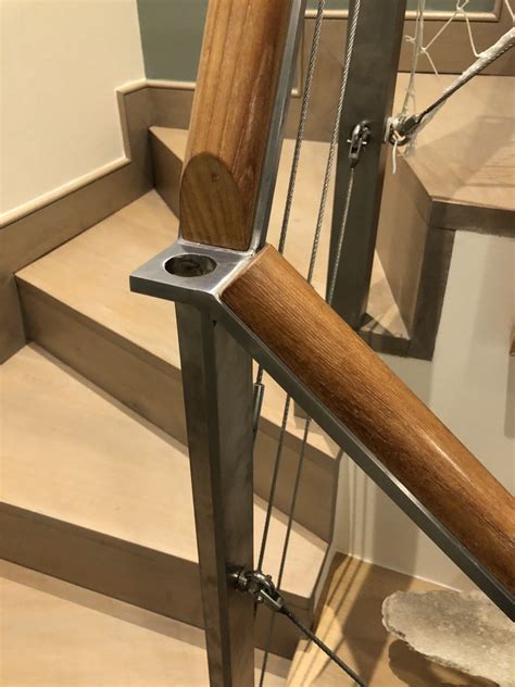 Atelier Métal Création Rampe et garde corps inox bois et filet de