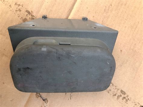 UCHWYT NA KUBKI KUBEK VW T4 Multivan Caravelle 8706337003 Oficjalne