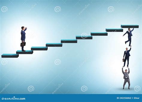 Teamwork Concept With Businessmen Helping Each Other Stock Photo